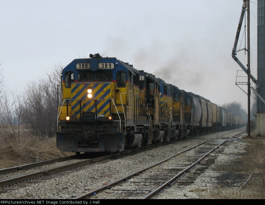 389 leading 3 more GP35's south with a grain train